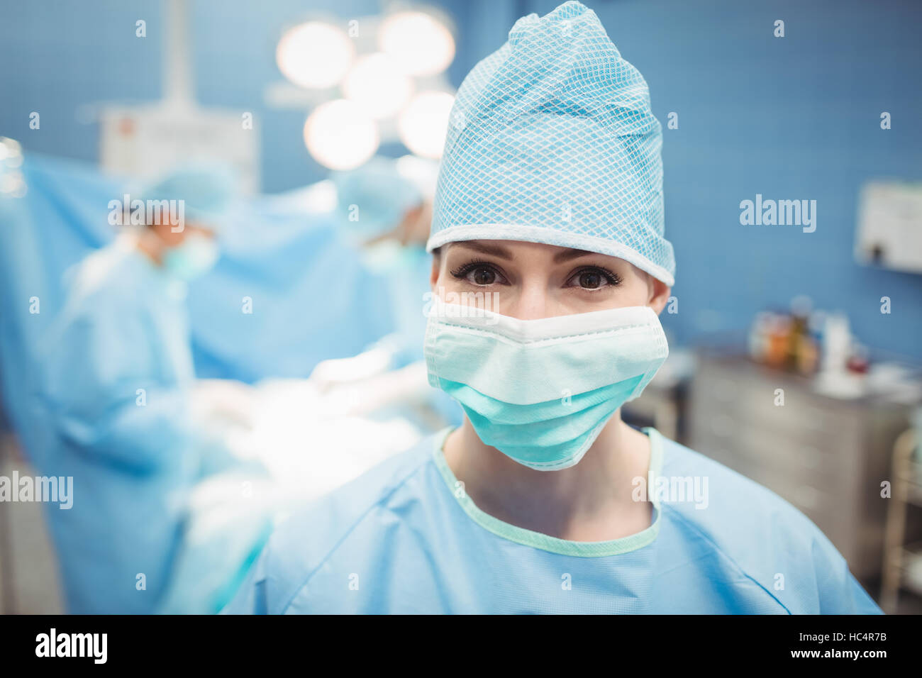 Portrait of female surgeon in operation room Stock Photo - Alamy