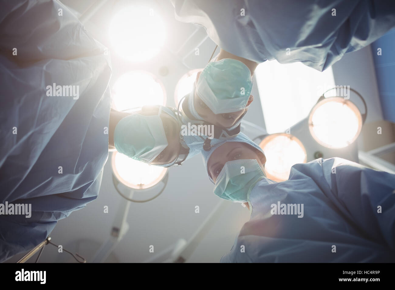 Surgeons performing operation in operation room Stock Photo - Alamy