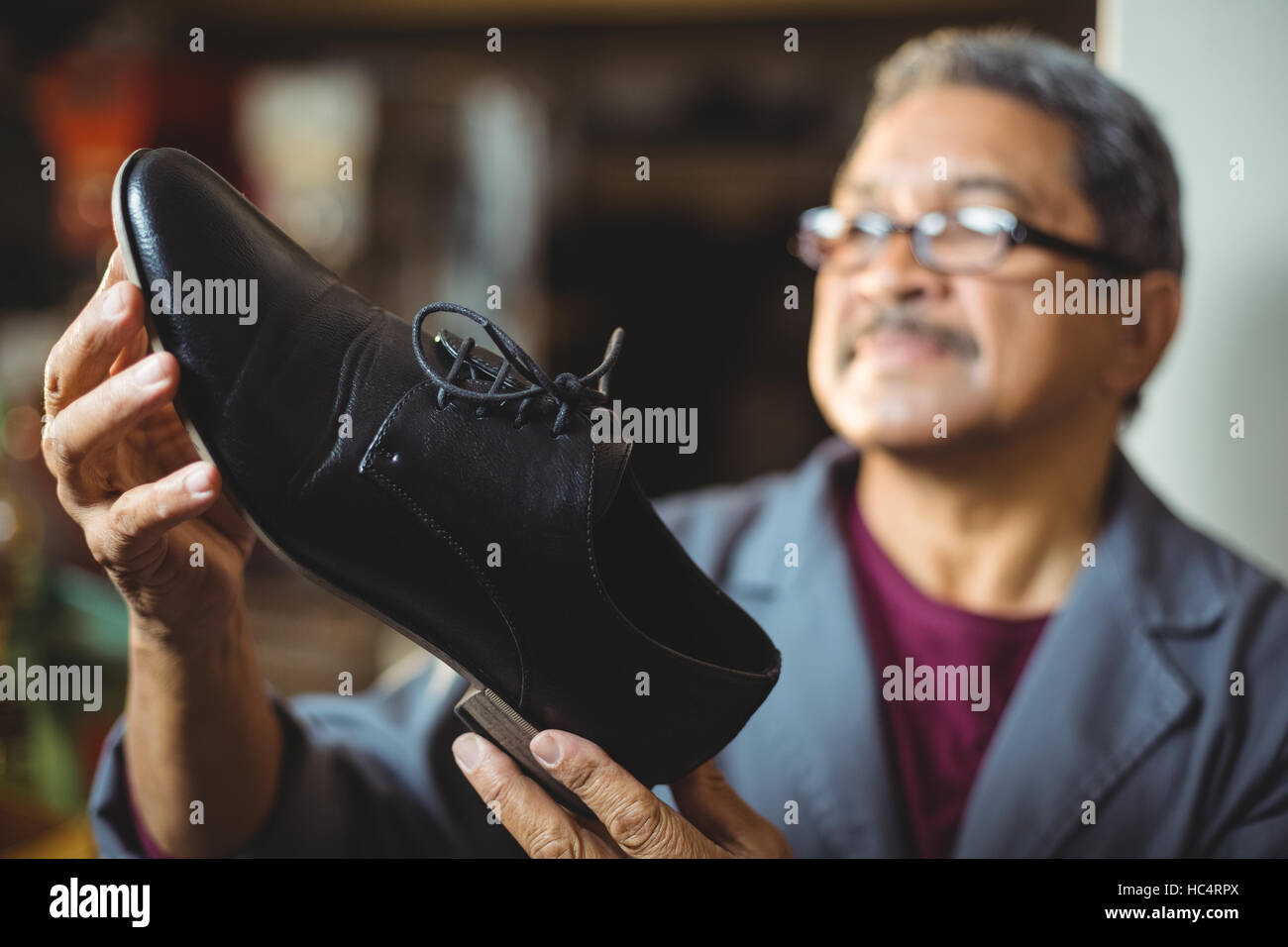 Examining material hi-res stock photography and images - Alamy