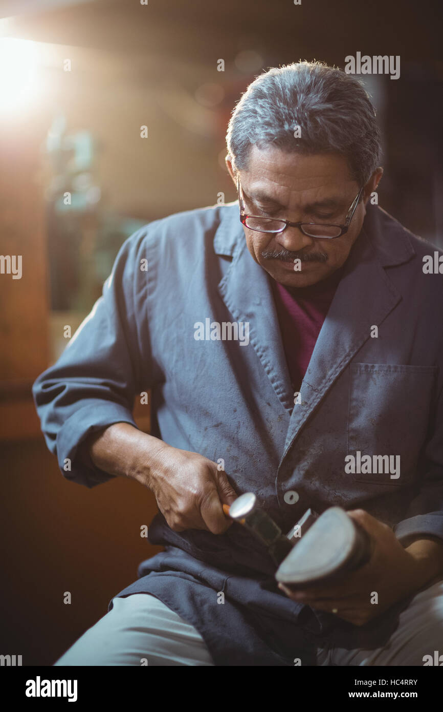 Cobbler shoe hammer hi-res stock photography and images - Alamy