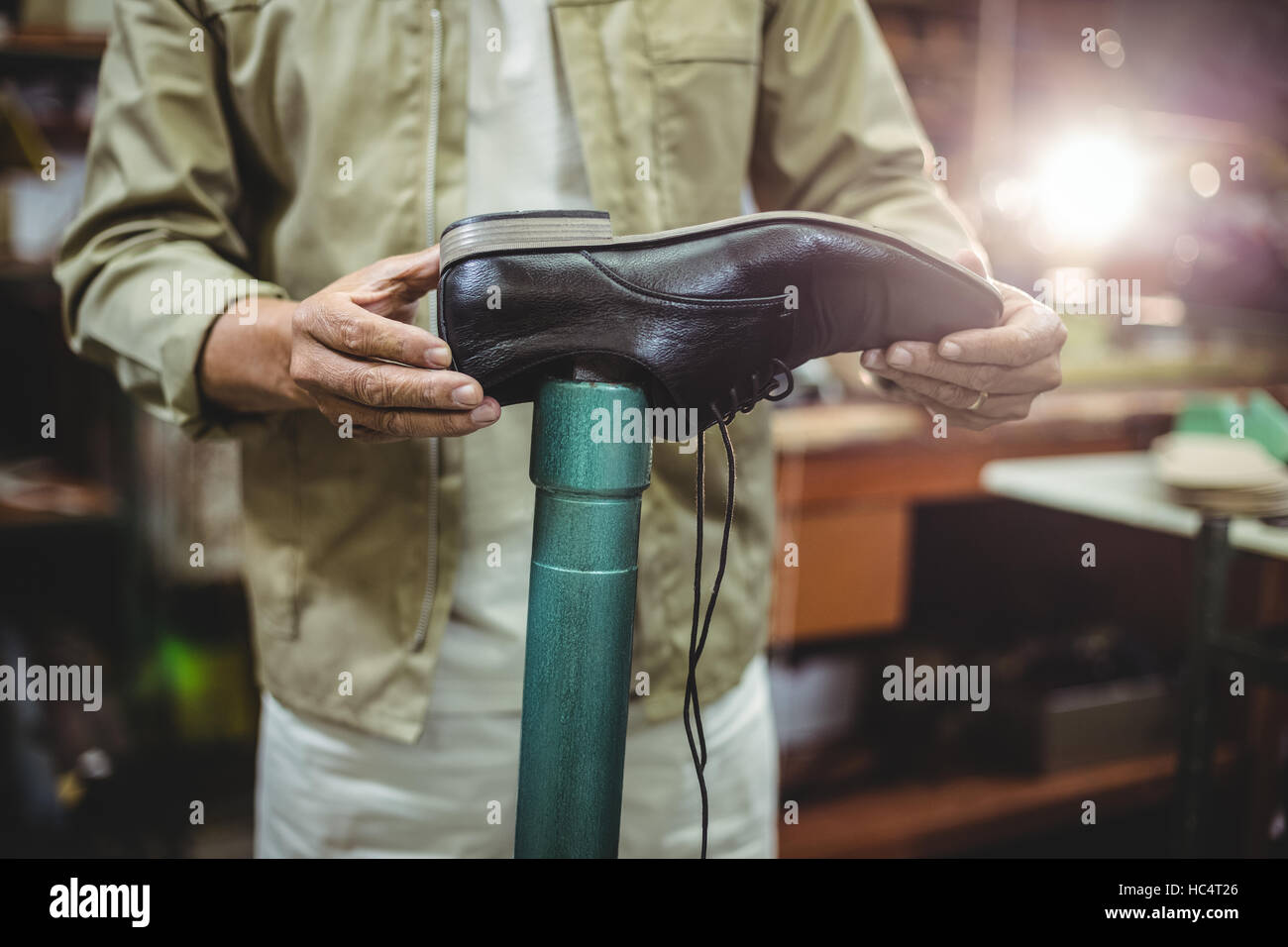 Repairing the shoe hi-res stock photography and images - Alamy