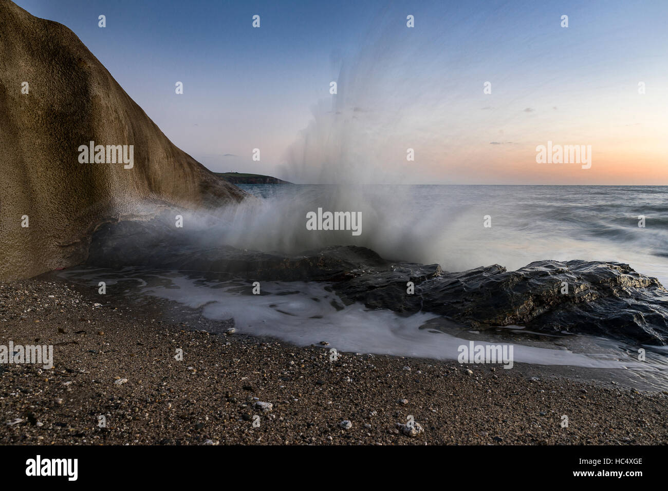 Large wave crashing against the sea wall, Spit beach. Taken with a long ...