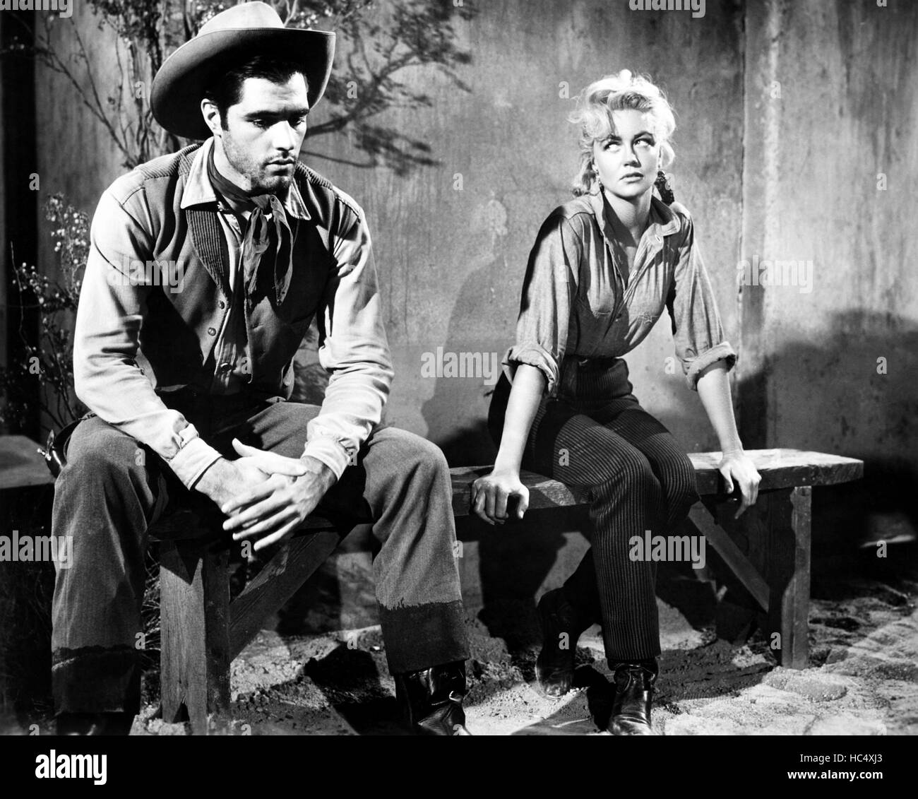 QUANTEZ, from left, John Gavin, Dorothy Malone, 1957 Stock Photo - Alamy