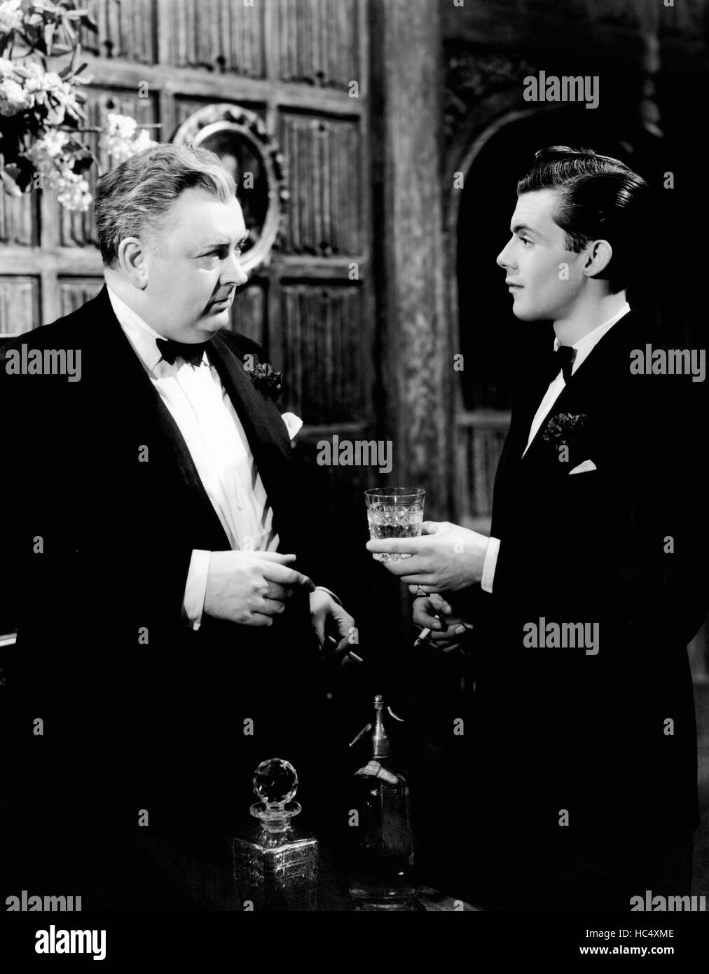 QUARTET, from left: Raymond Lovell, Dirk Bogarde, (segment 'The Alien Corn'), 1948 Stock Photo ...