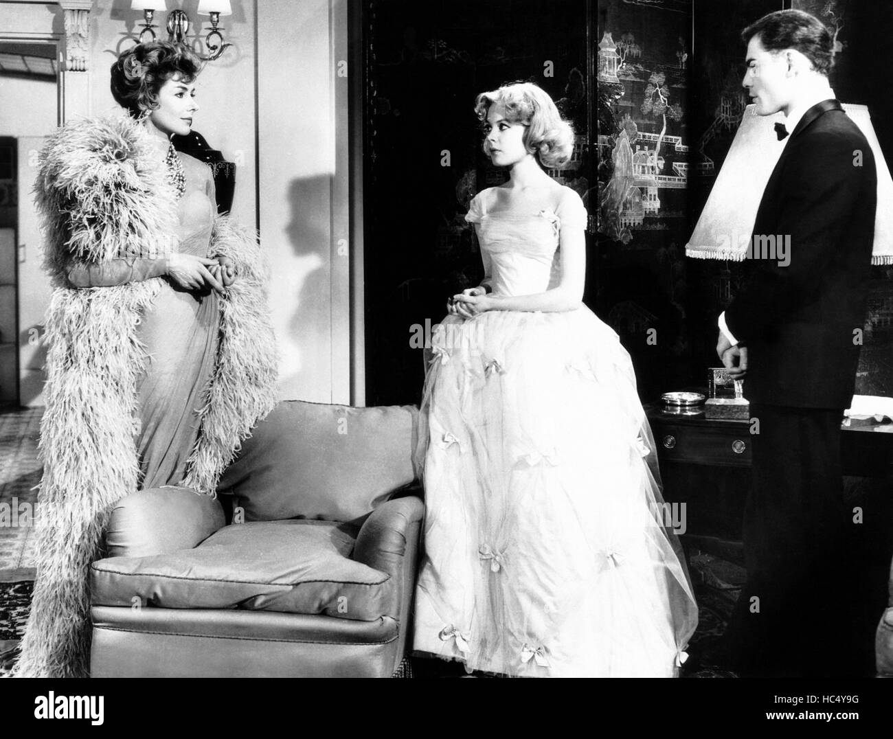 THE RELUCTANT DEBUTANTE, from left, Kay Kendall, Sandra Dee,John Saxon ...