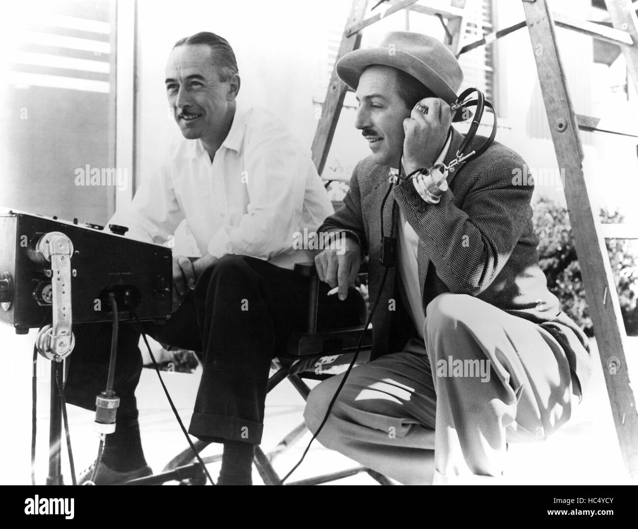 THE RELUCTANT DRAGON, Walt Disney listening to recording on set, 1941 ...