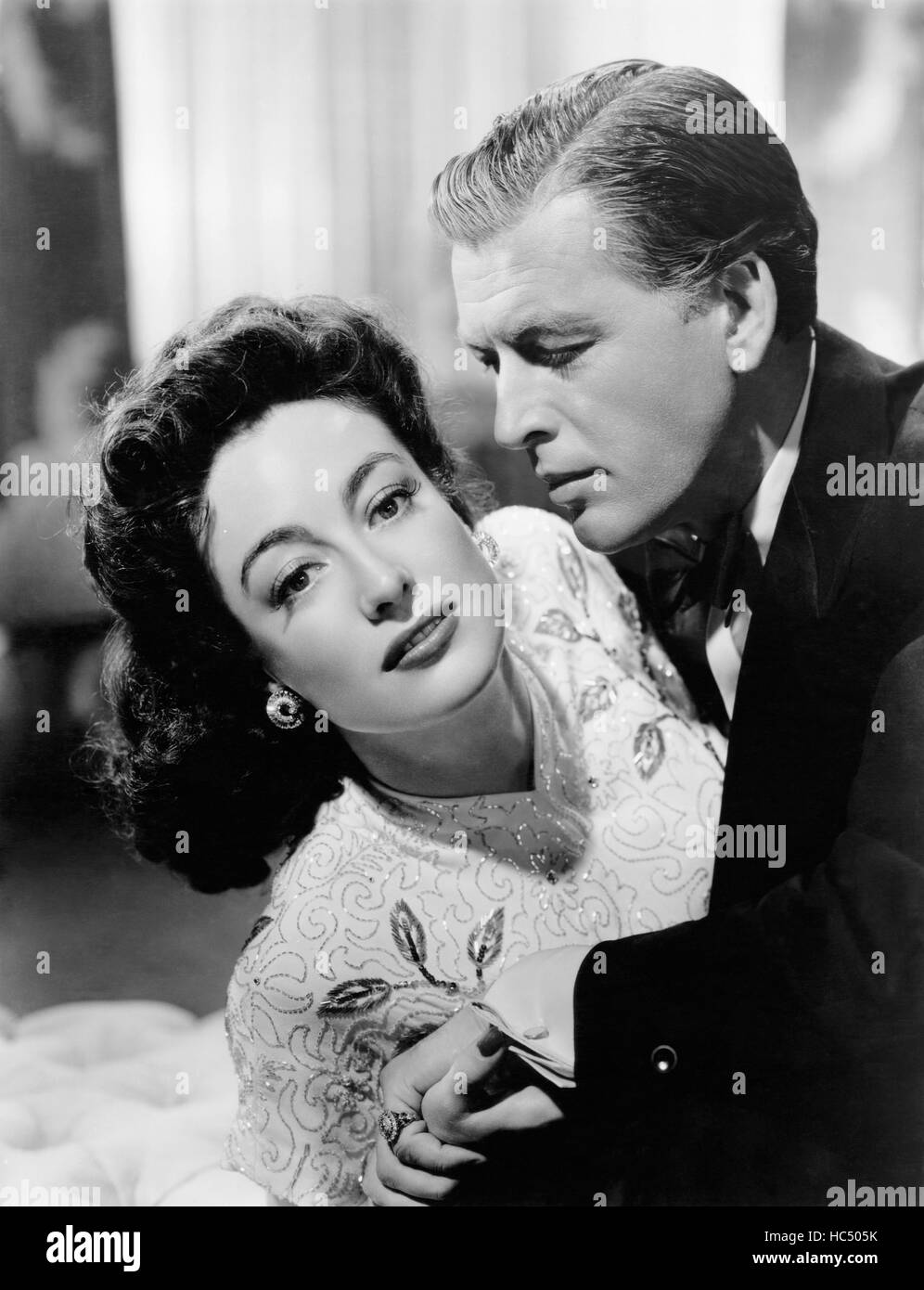 REUNION IN FRANCE, Joan Crawford, Philip Dorn, 1942 Stock Photo - Alamy