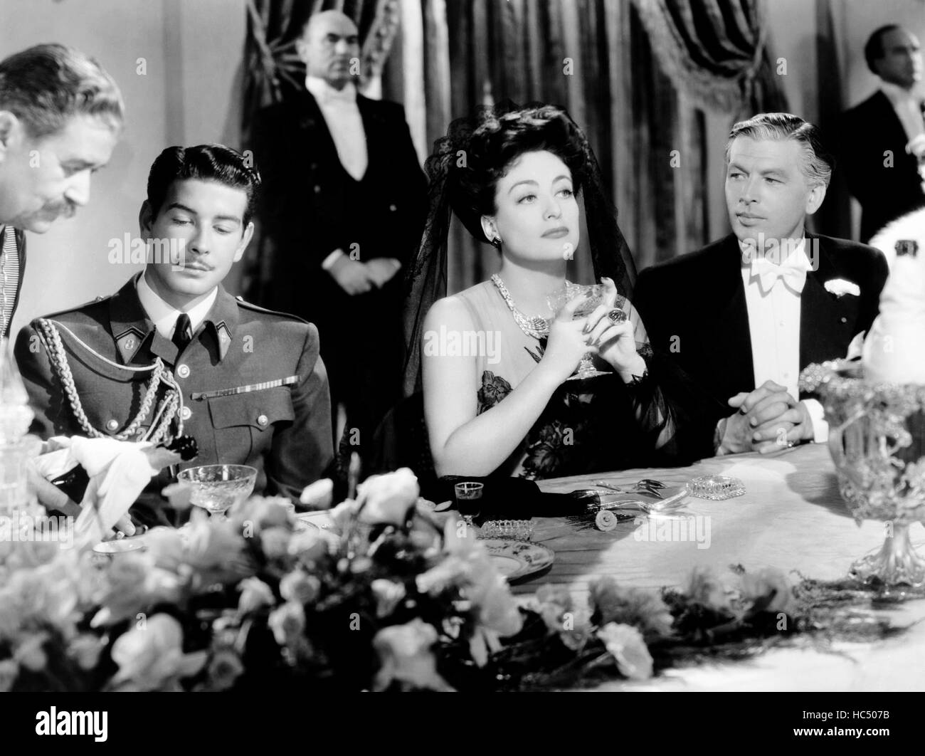 REUNION IN FRANCE, from left, center, Joan Crawford, Philip Dorn, 1942 ...