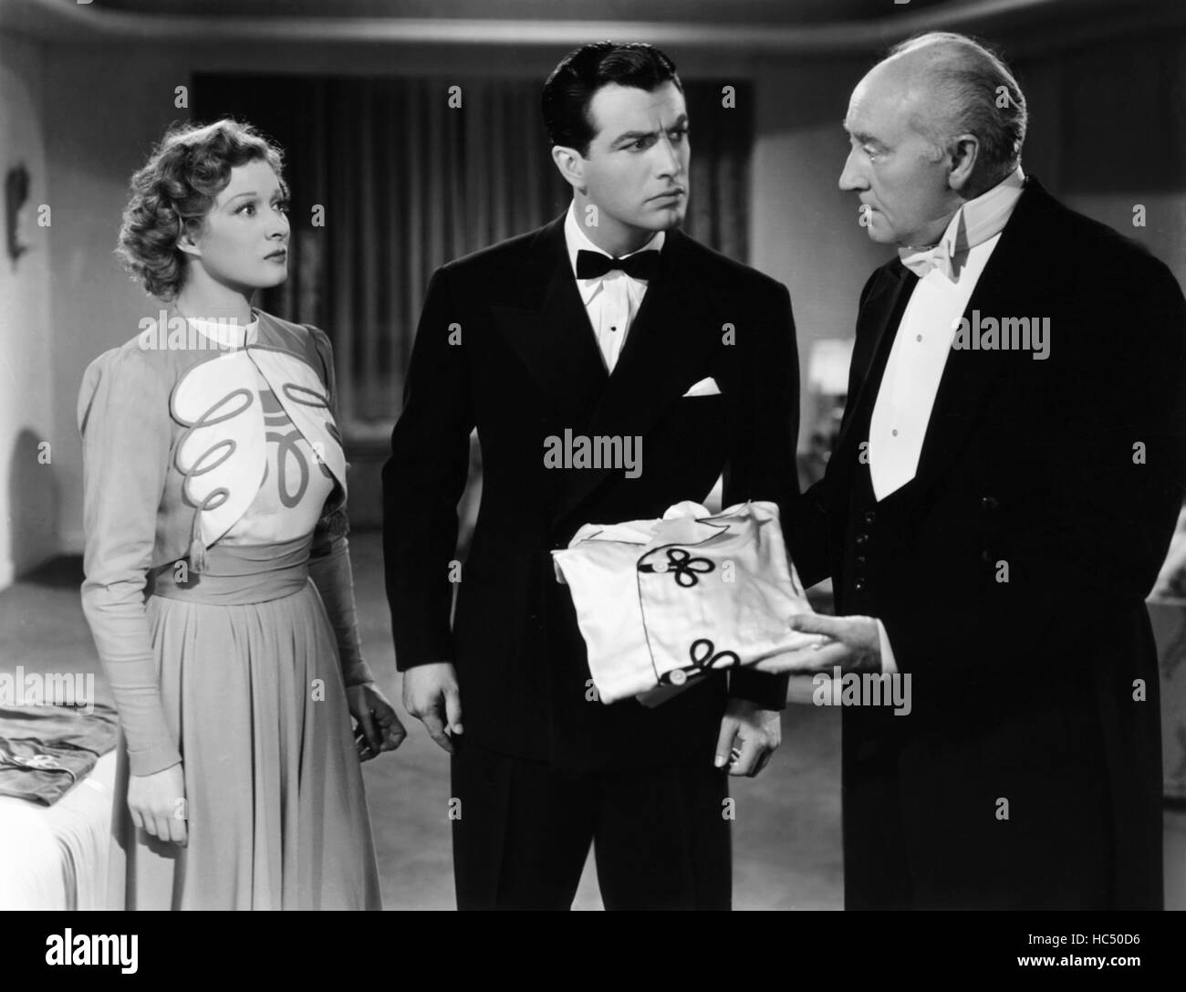 REMEMBER?, from left, Greer Garson, Robert Taylor, Halliwell Hobbes ...