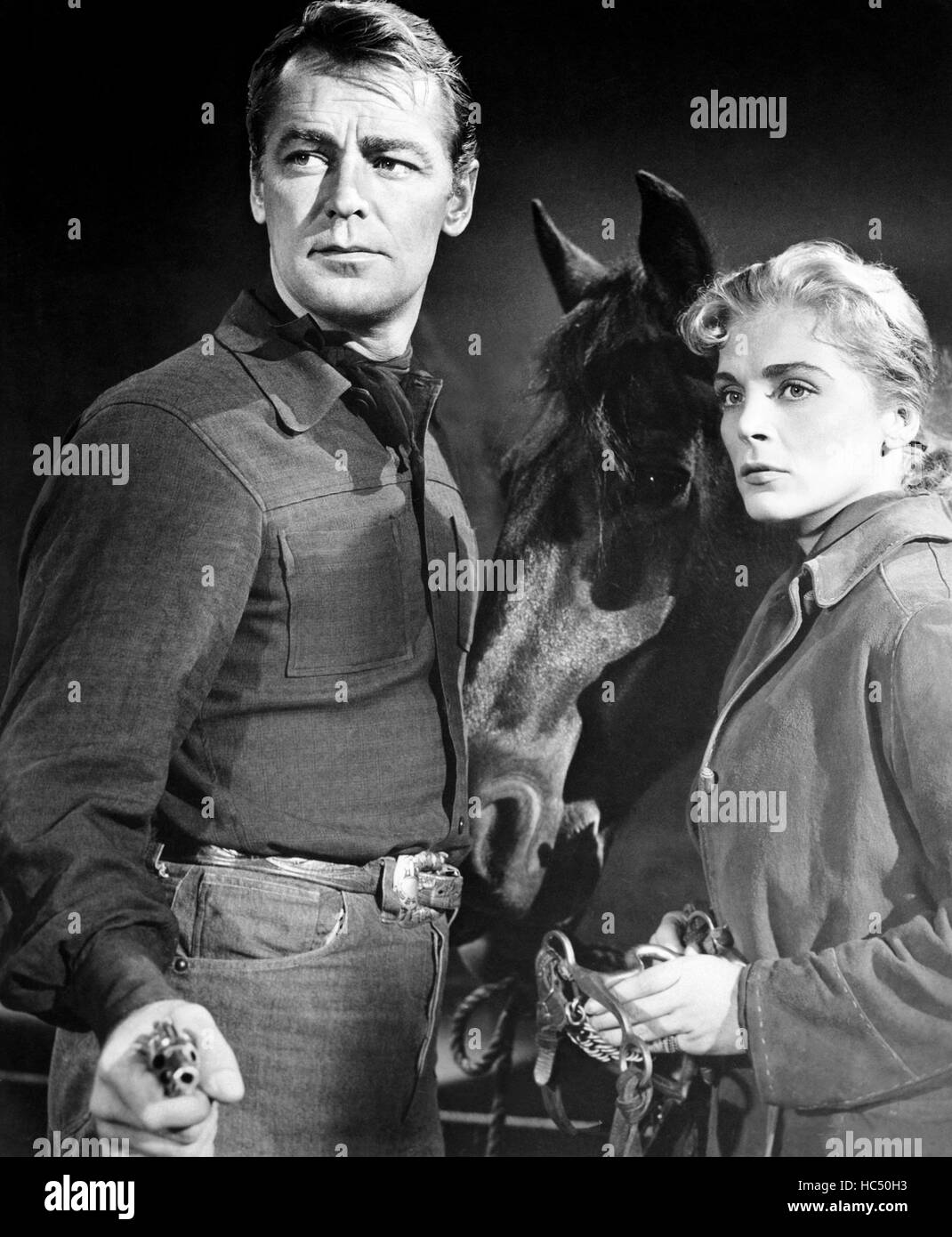 RED MOUNTAIN, from left: Alan Ladd, Lizabeth Scott, 1951 Stock Photo ...