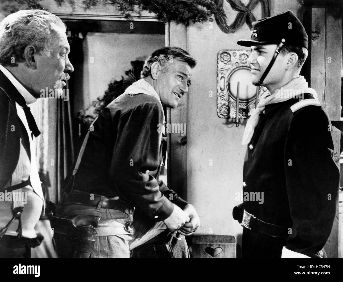 THE SEARCHERS, from left, Ward Bond, John Wayne, Patrick Wayne, 1956 Stock Photo - Alamy