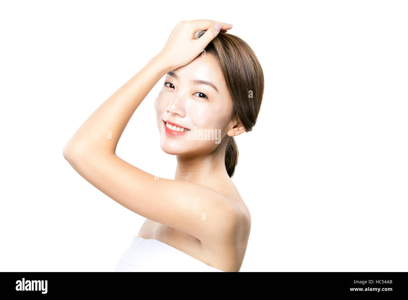 Side view portrait of young smiling woman in tube top Stock Photo - Alamy