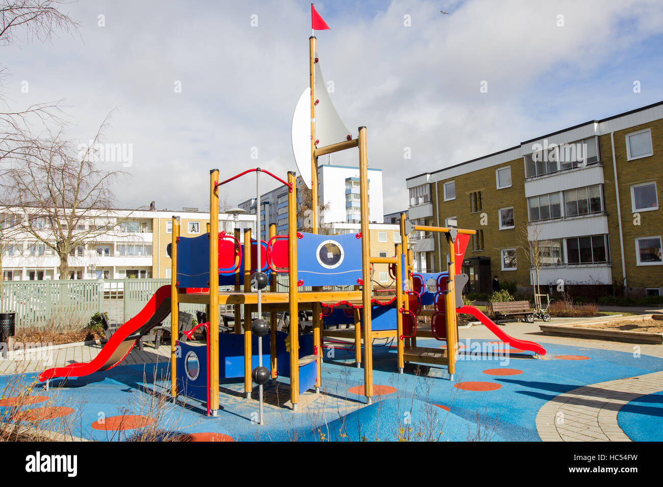 Children outdoor playground in park Stock Photo - Alamy