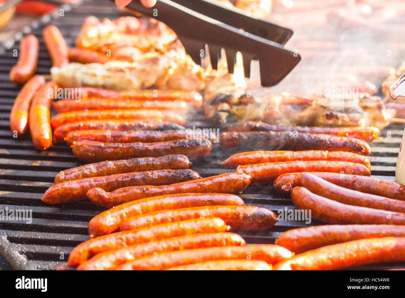 Grilled meat on the barbecue,cooked outdoor Stock Photo - Alamy