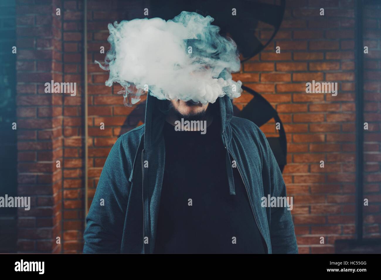 Man vaping an electronic cigarette Stock Photo - Alamy
