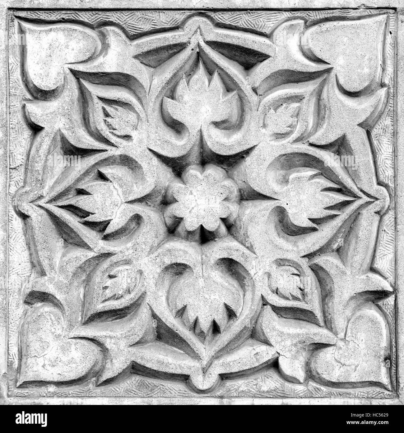 abstract floral ornament, a stone bas-relief on the wall Stock Photo ...