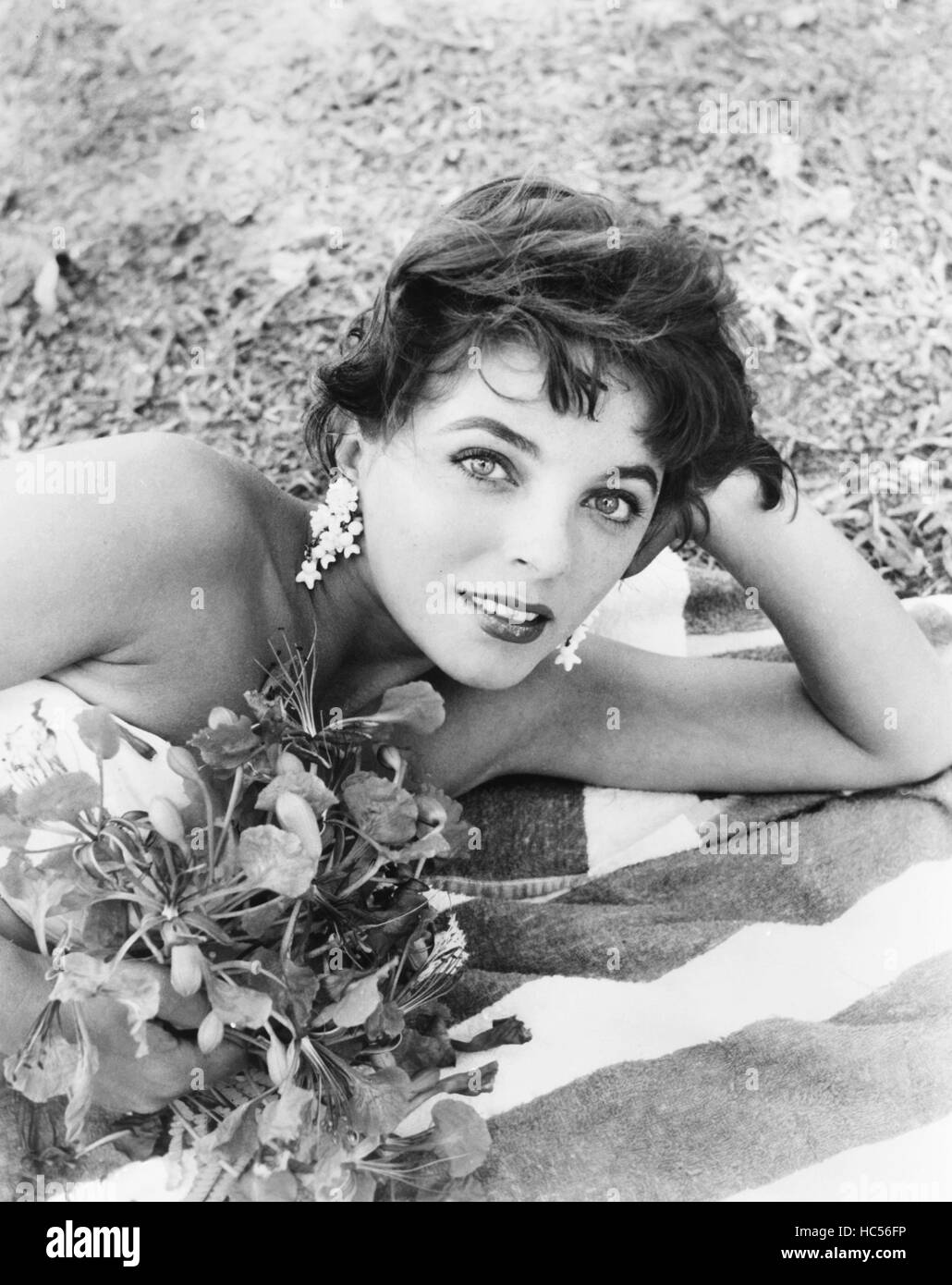 SEA WIFE, Joan Collins, on-set, between takes, 1957, ©20th Century Fox ...