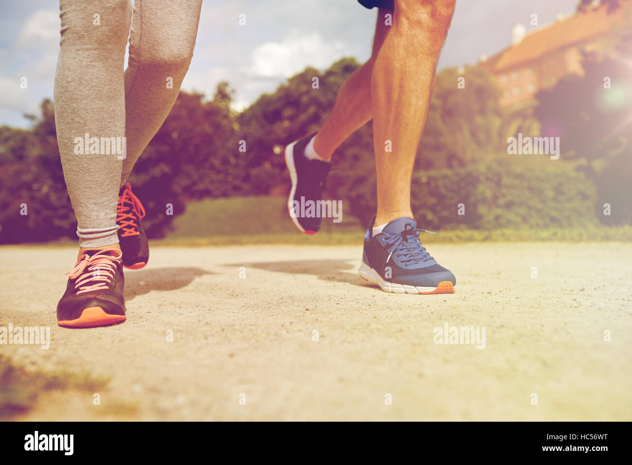 close up of couple running outdoors Stock Photo - Alamy