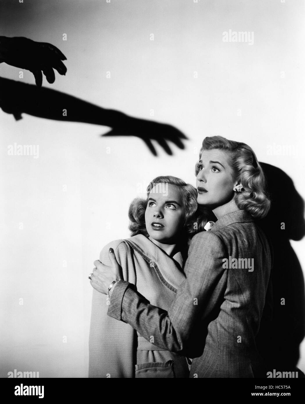 SHADOWED, from left: Terry Moore, Anita Louise, 1946 Stock Photo - Alamy