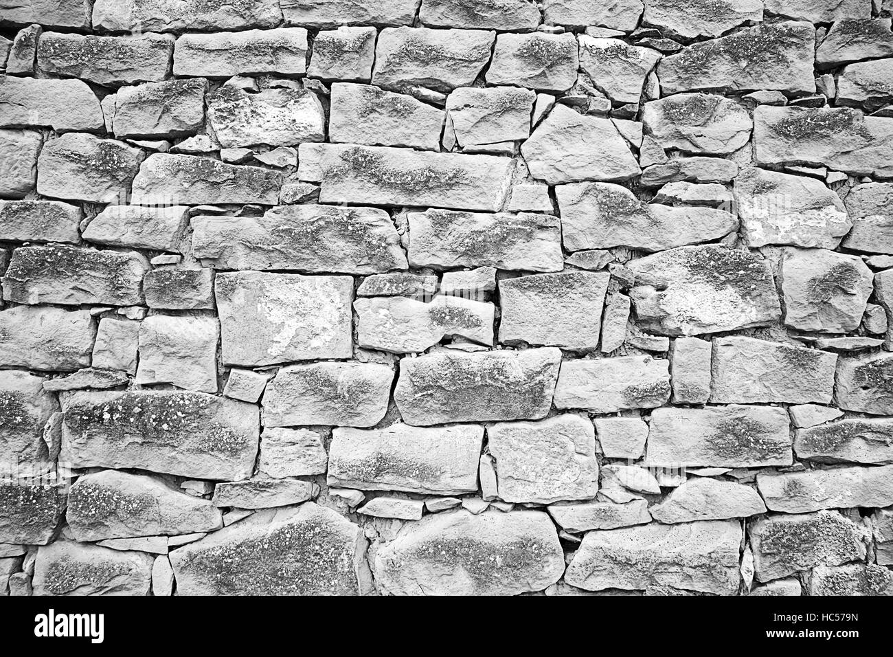 Gray stone wall in urban wall construction Stock Photo - Alamy
