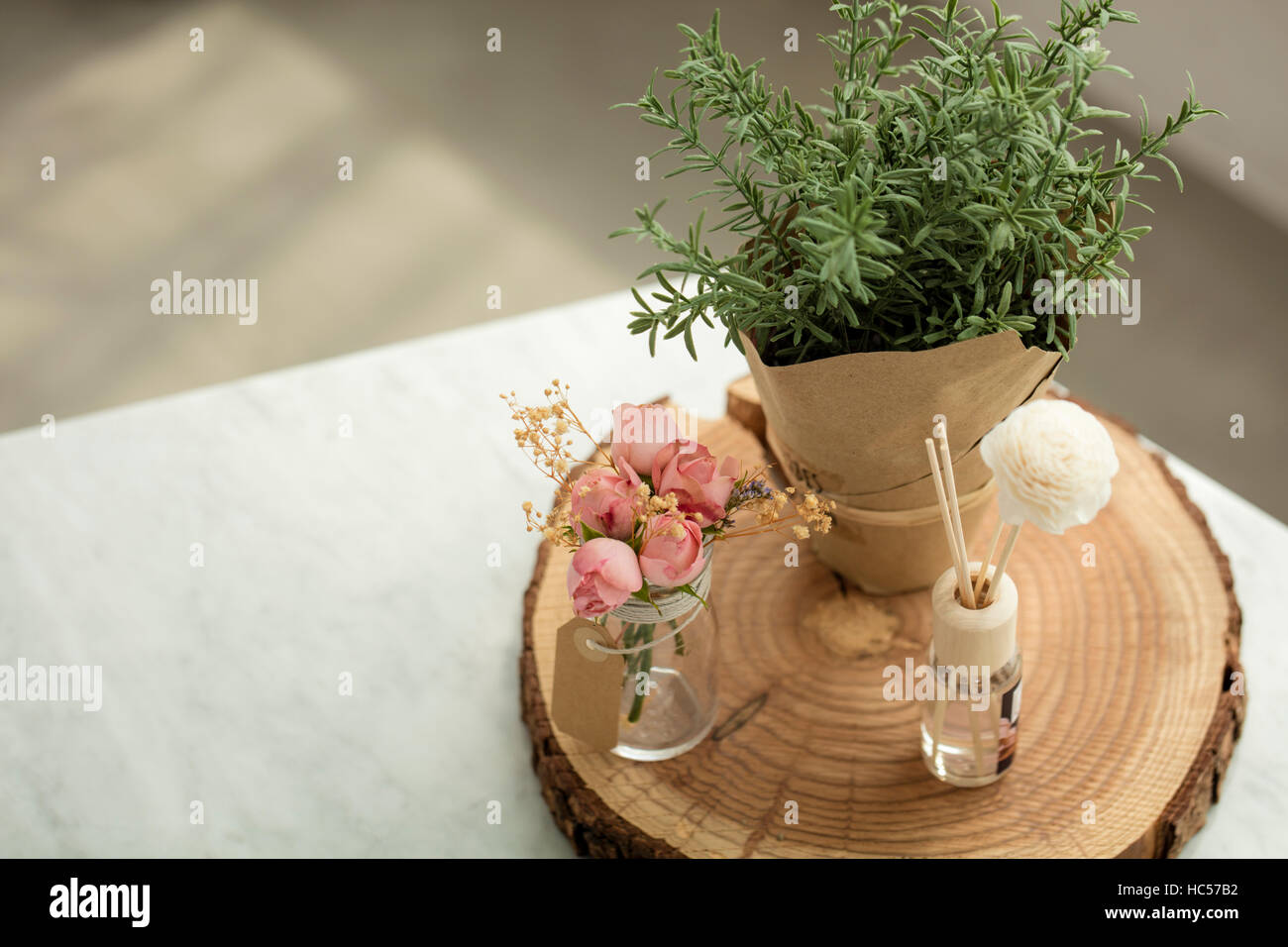 Spring with flowers, candles and diffuser Stock Photo - Alamy