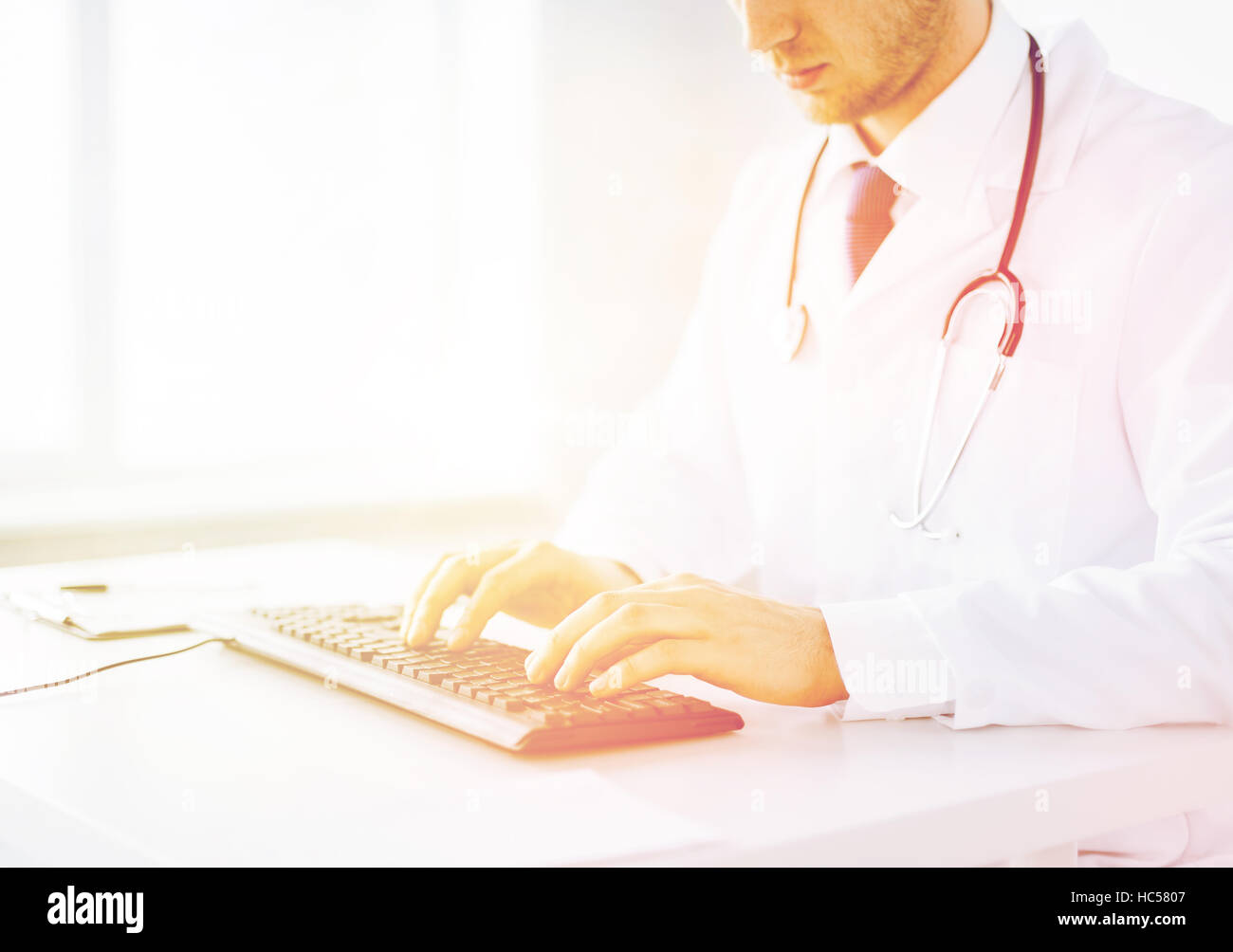 Doctor writing medical notes typing hi-res stock photography and images ...