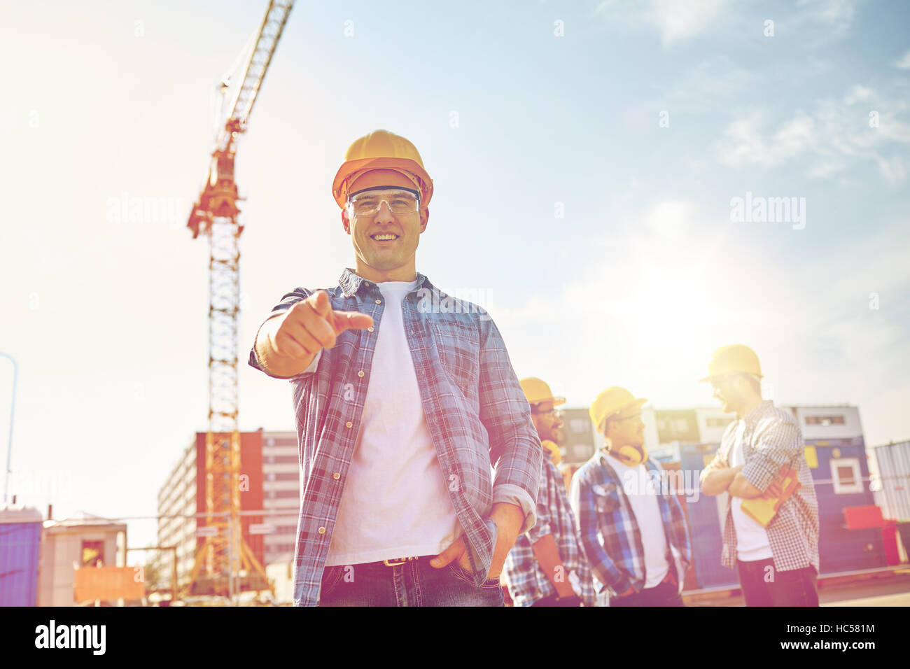 builders pointing finger at you on construction Stock Photo - Alamy