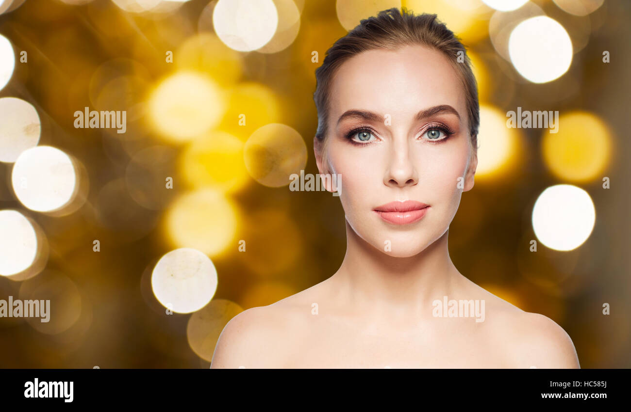 beautiful young woman face over white background Stock Photo - Alamy