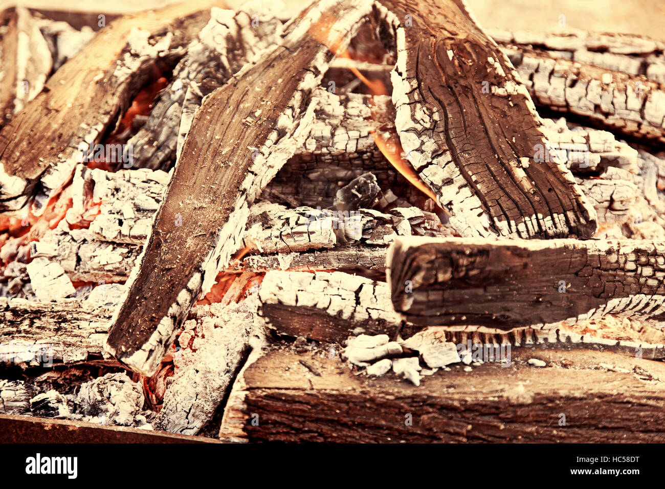 Wood fire burning embers in celebration grill Stock Photo - Alamy