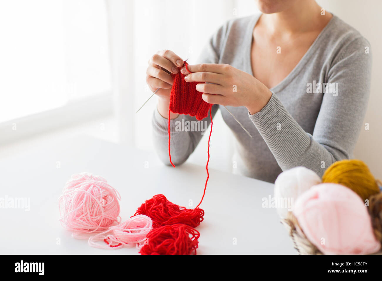 woman hands knitting with needles and yarn Stock Photo - Alamy