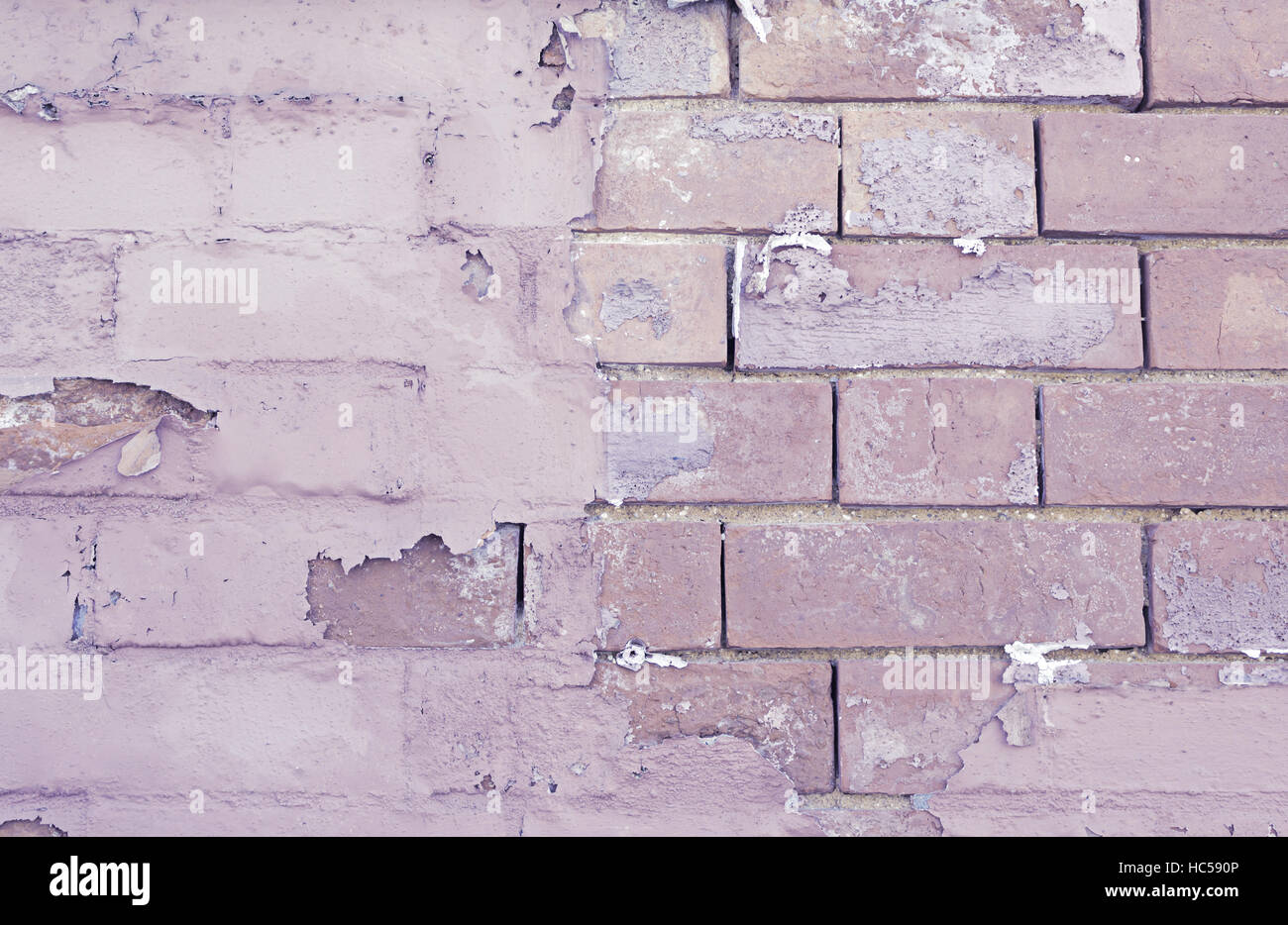 Bricks with breaks in urban building surface Stock Photo - Alamy