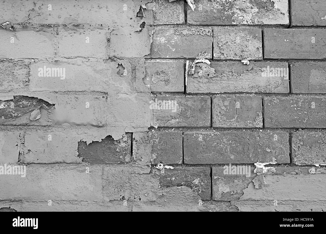Bricks with breaks in urban building surface Stock Photo - Alamy