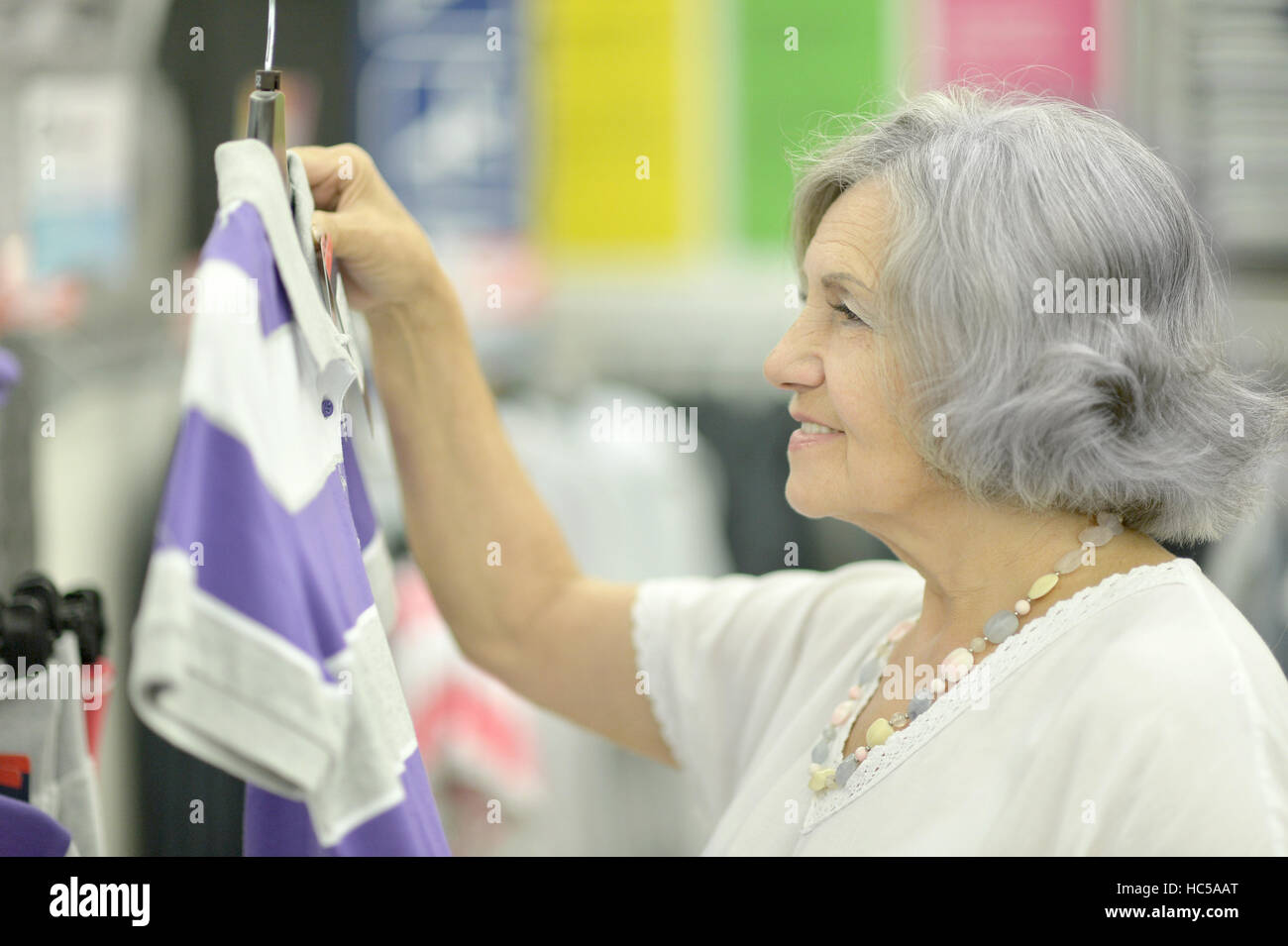 Mature woman chooses new hi-res stock photography and images - Alamy