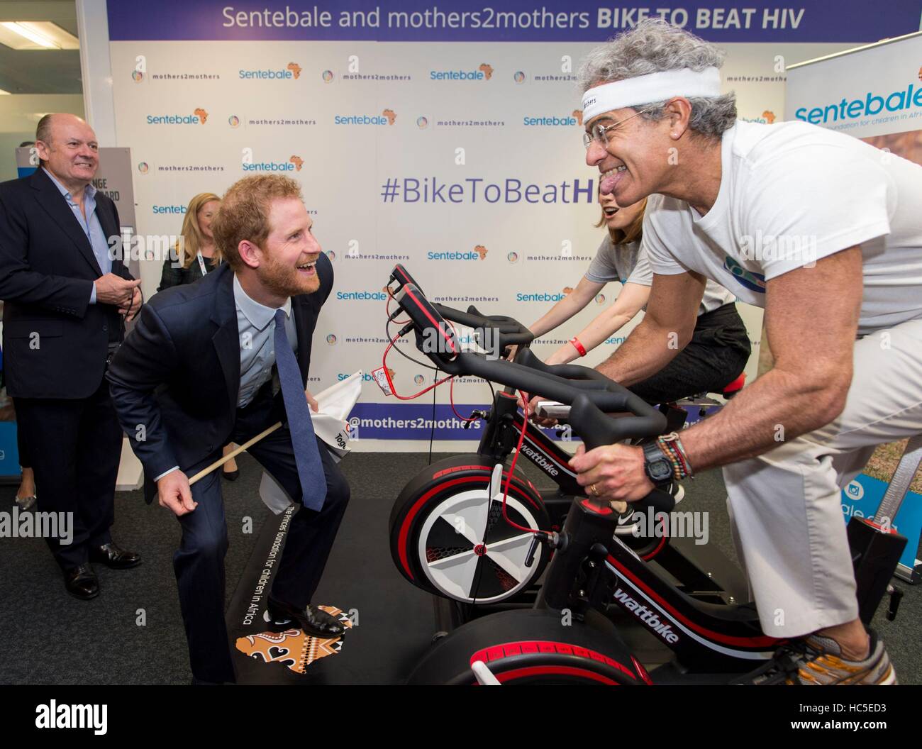 Prince Harry watches Laura Main and Dr Mitch on bikes as he joins City ...