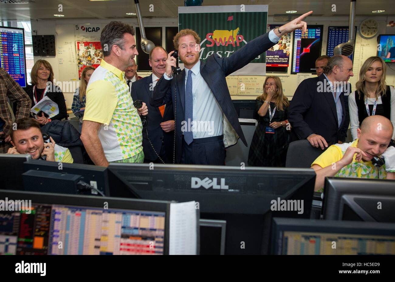 Prince Harry with Edward Bird as he joins City brokers at ICAP and ...