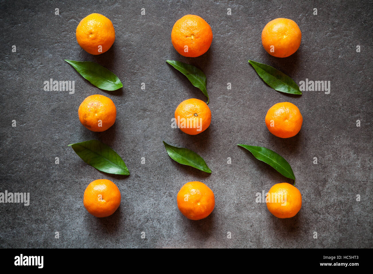 Fresh tangerines with leaves Stock Photo - Alamy