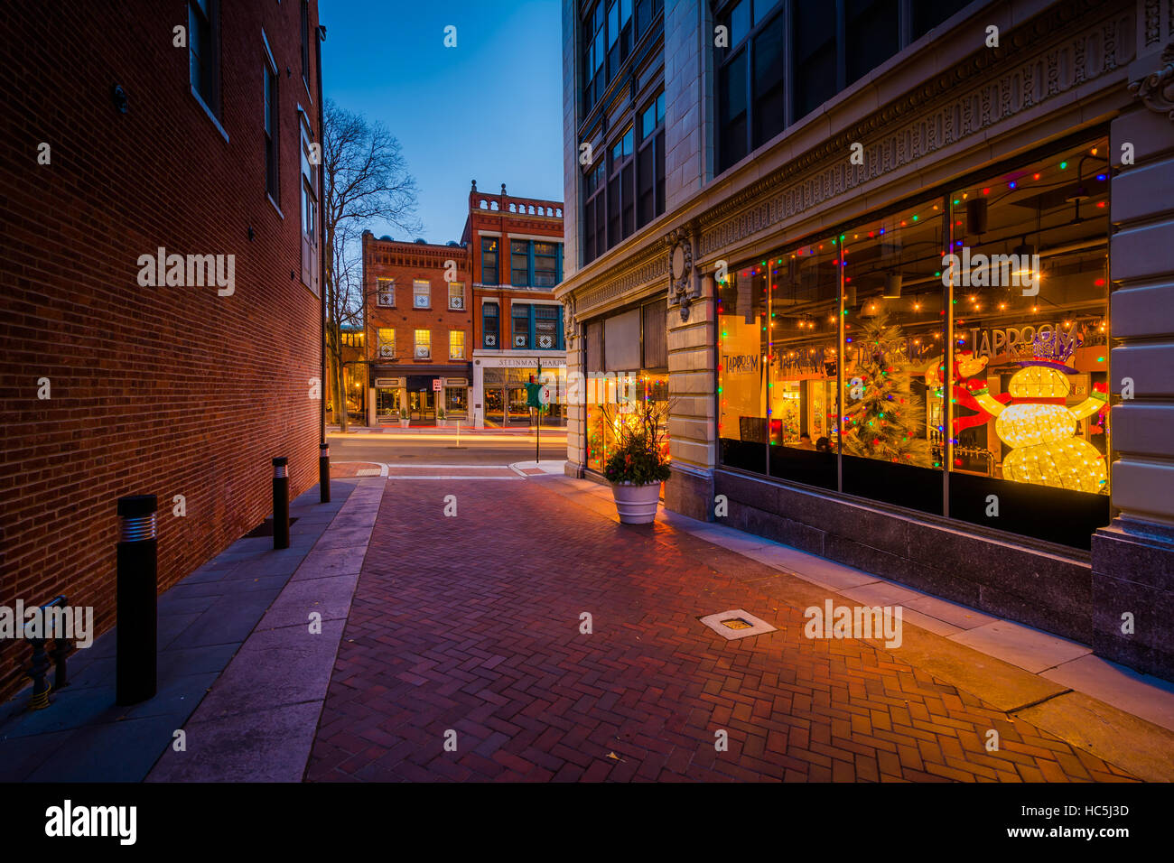 An alley and buildings at night, in Lancaster, Pennsylvania Stock Photo ...