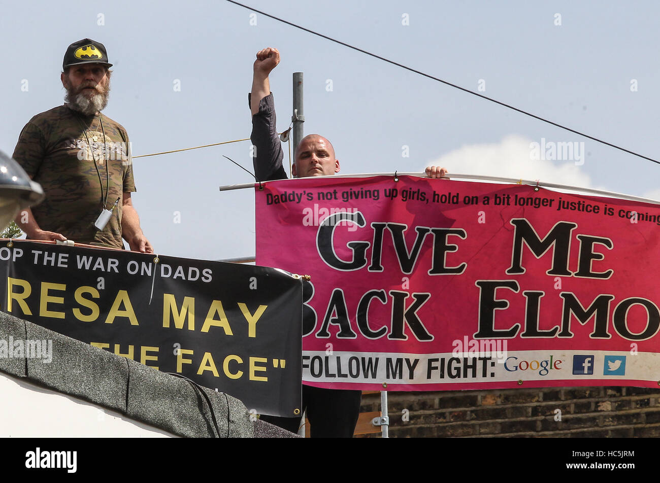 Two protesters from the Fathers for Justice campaign stage a protest on ...