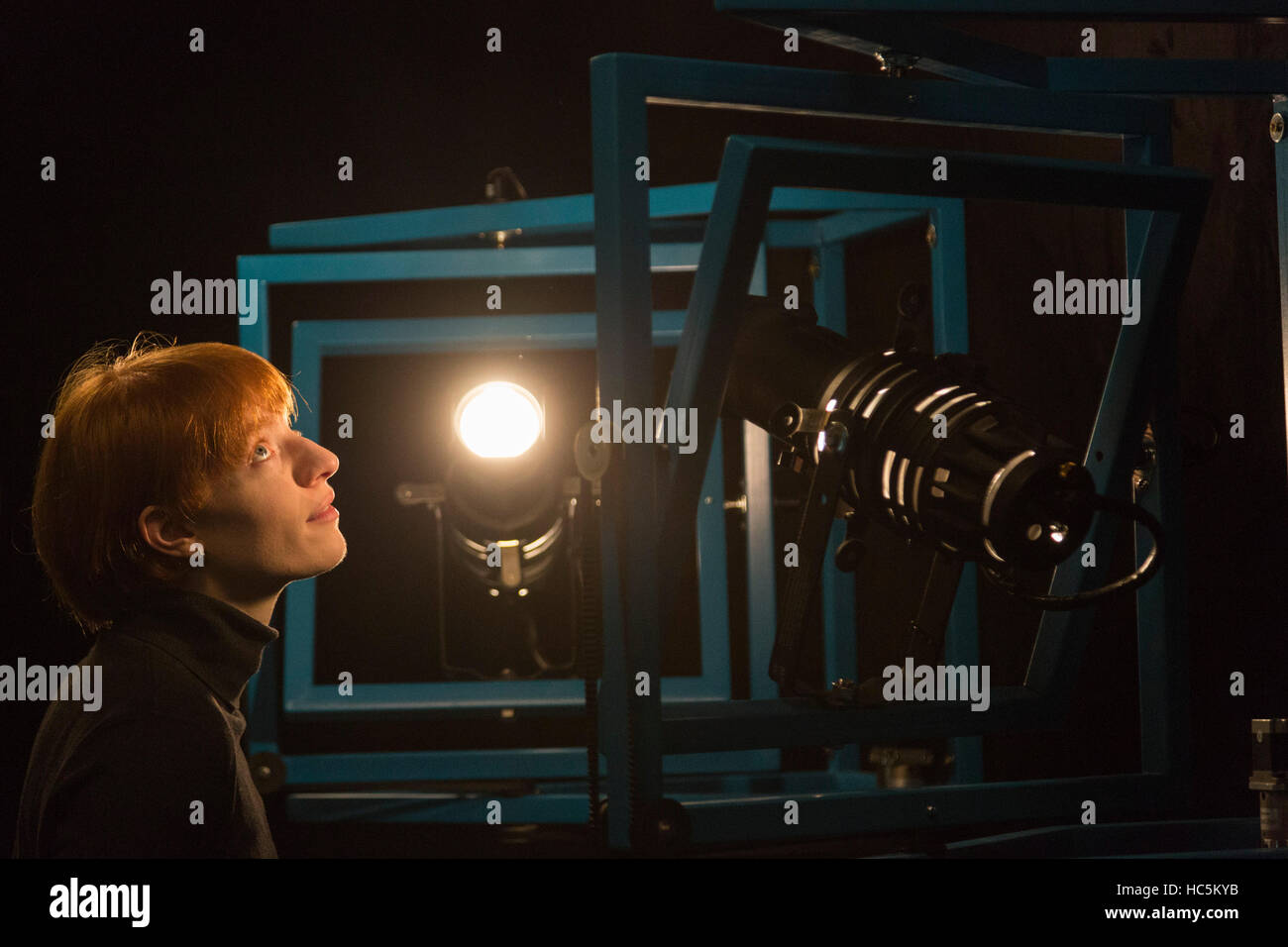 London, UK. 7 December 2016. A gallery assistant looks at the artwork ...