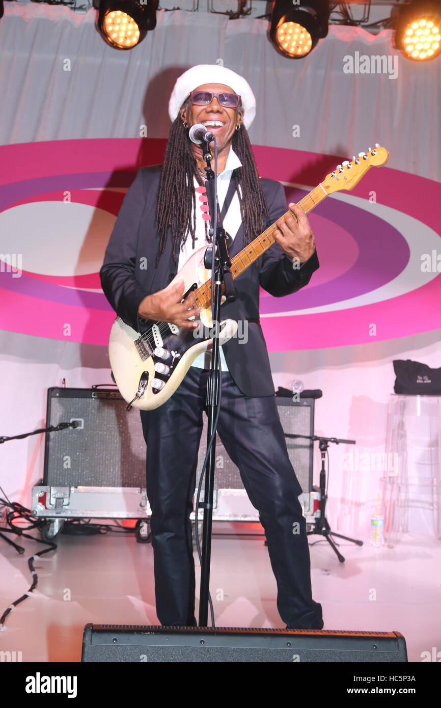 Nile Rodgers performing at the 2016 Hamptons Paddle & Party For Pink at ...