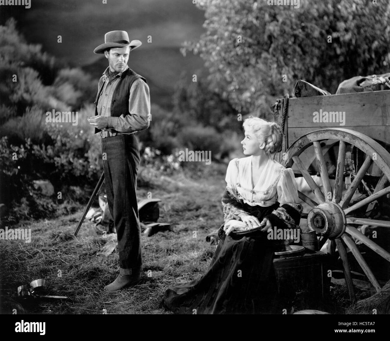 ROUGHSHOD, from left, Robert Sterling, Gloria Grahame, 1949 Stock Photo ...