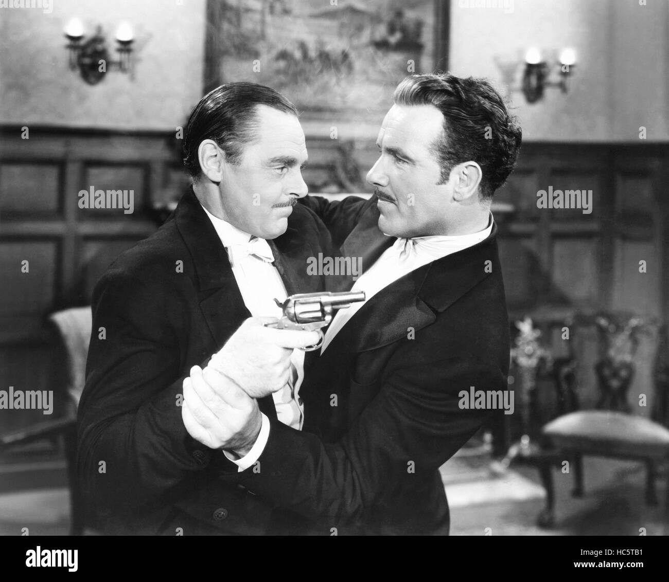 THE ROUNDUP, from left: Jerome Cowan, Preston Foster, 1941 Stock Photo ...
