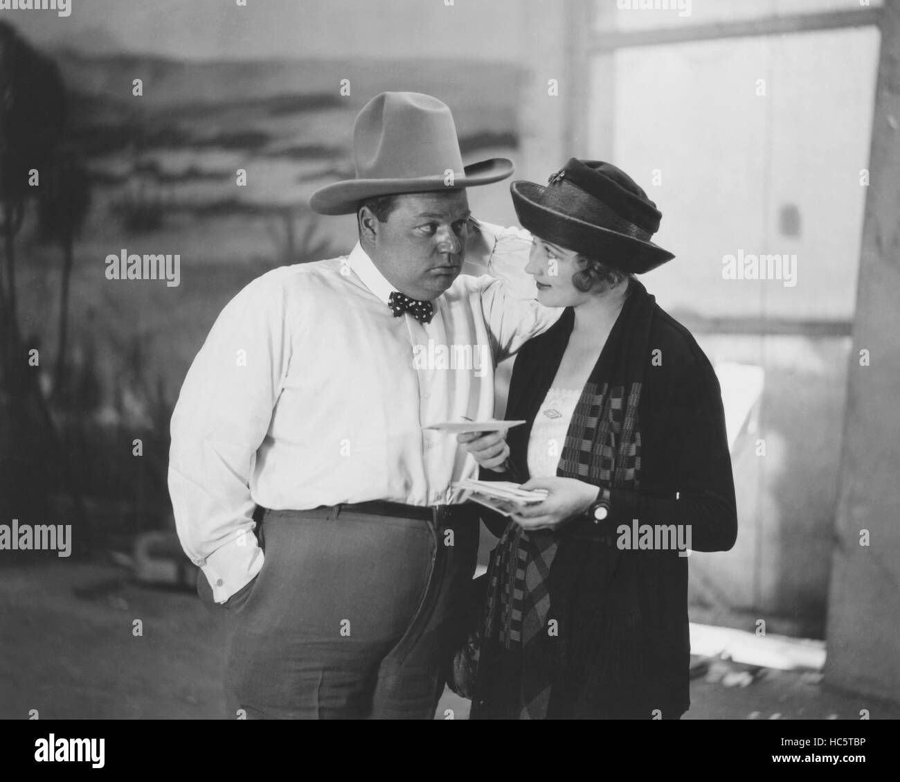 THE ROUND-UP, from left, Roscoe Arbuckle, (aka Fatty Arbuckle), Mabel ...