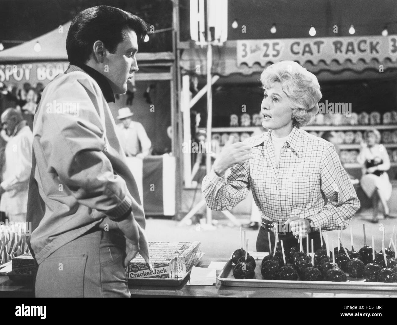 ROUSTABOUT, from left, Elvis Presley, Barbara Stanwyck, 1964 Stock ...