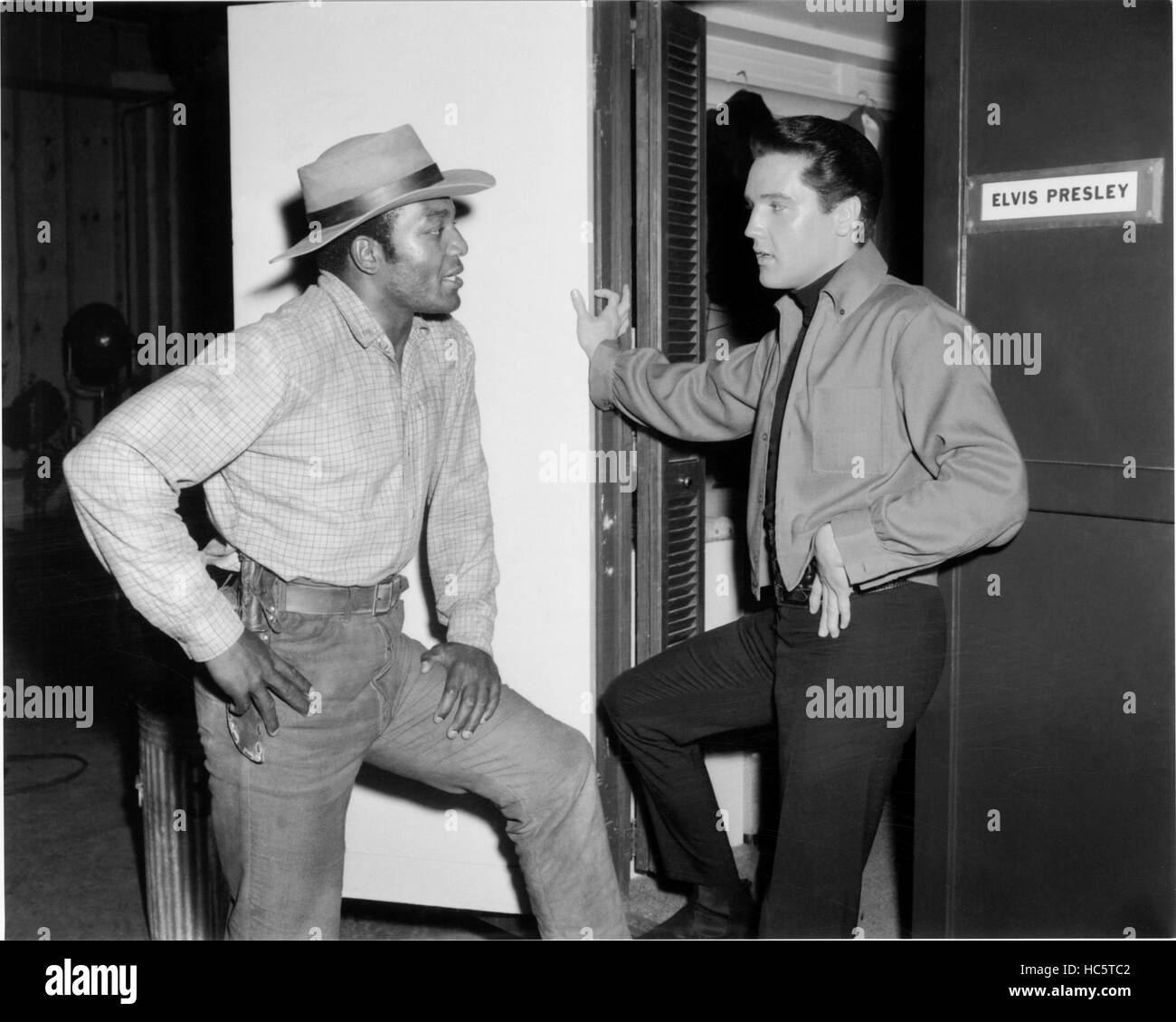 ROUSTABOUT, from left, Jim Brown, Elvis Presley, on-set, 1964 Stock ...