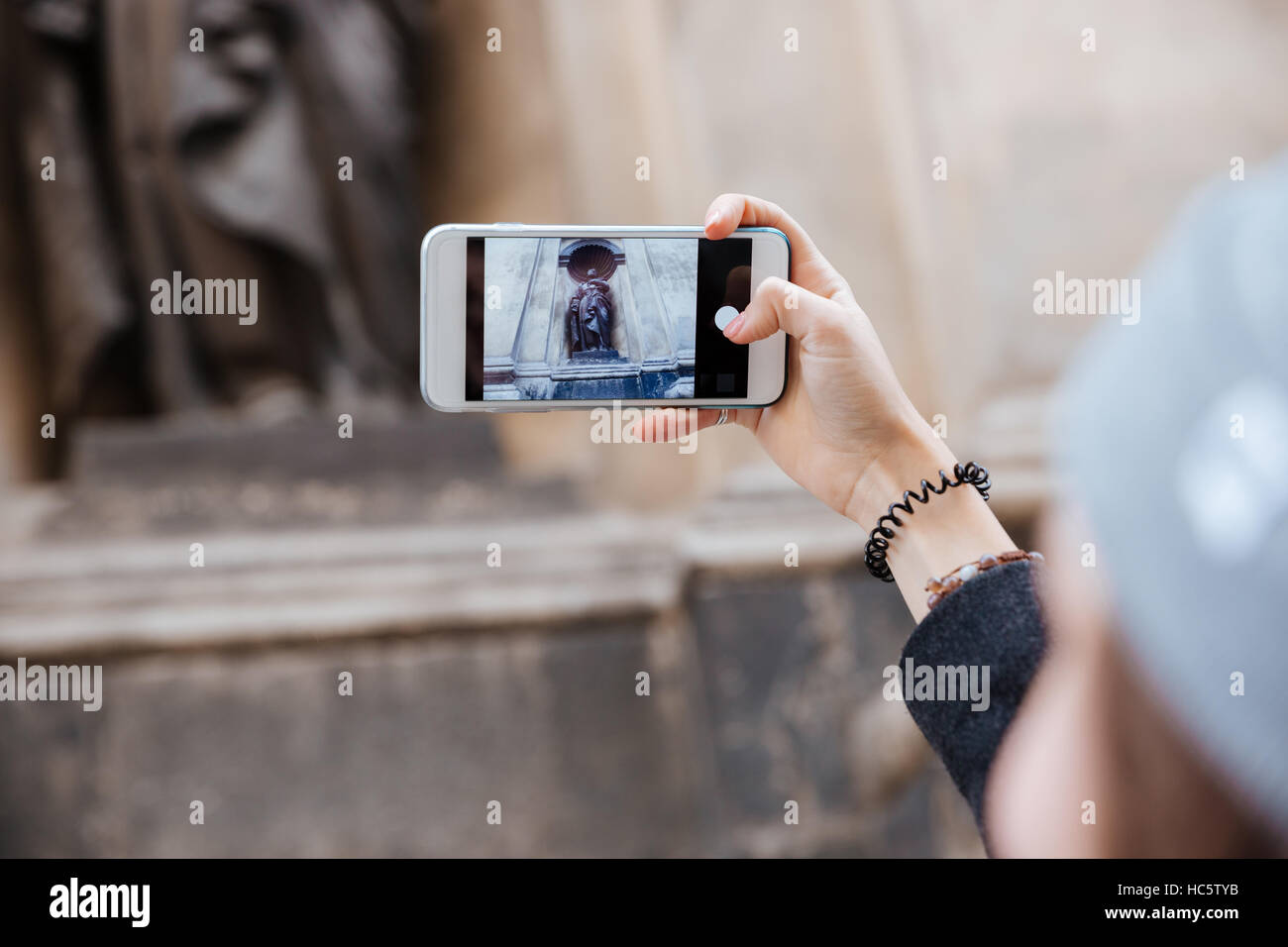 Woman make a photo. holding phone in hand Stock Photo - Alamy