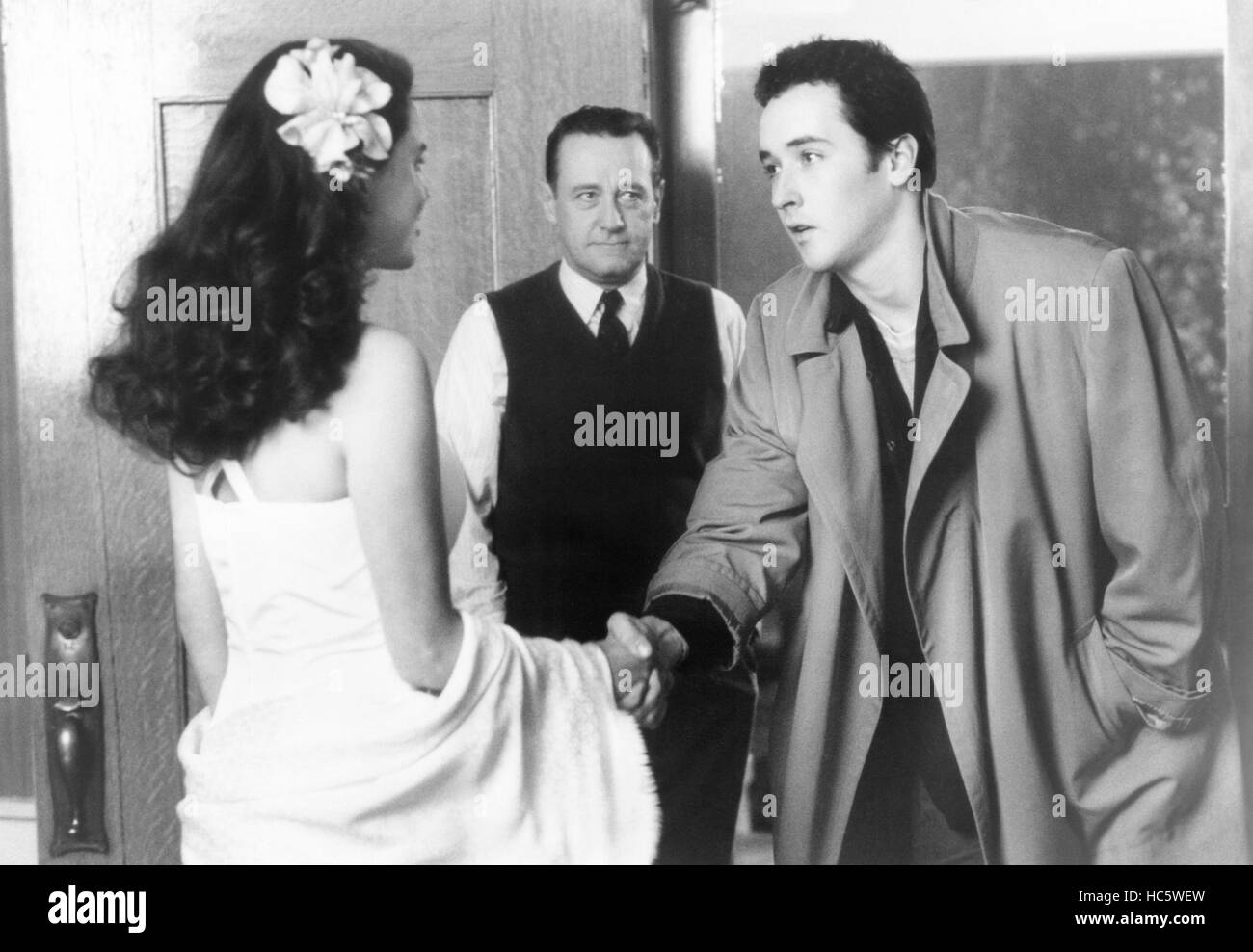 SAY ANYTHING, from left: Ione Skye, John Mahoney (back), John Cusack, 1989. 1989. ©20th Century ...