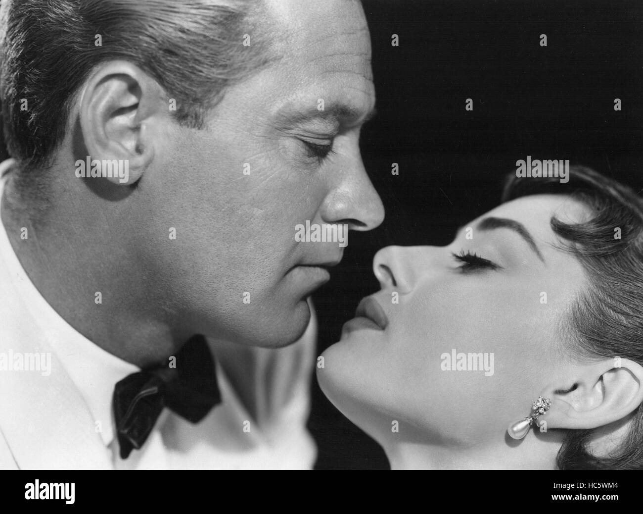 SABRINA, William Holden, Audrey Hepburn, about to kiss, 1954 Stock Photo - Alamy