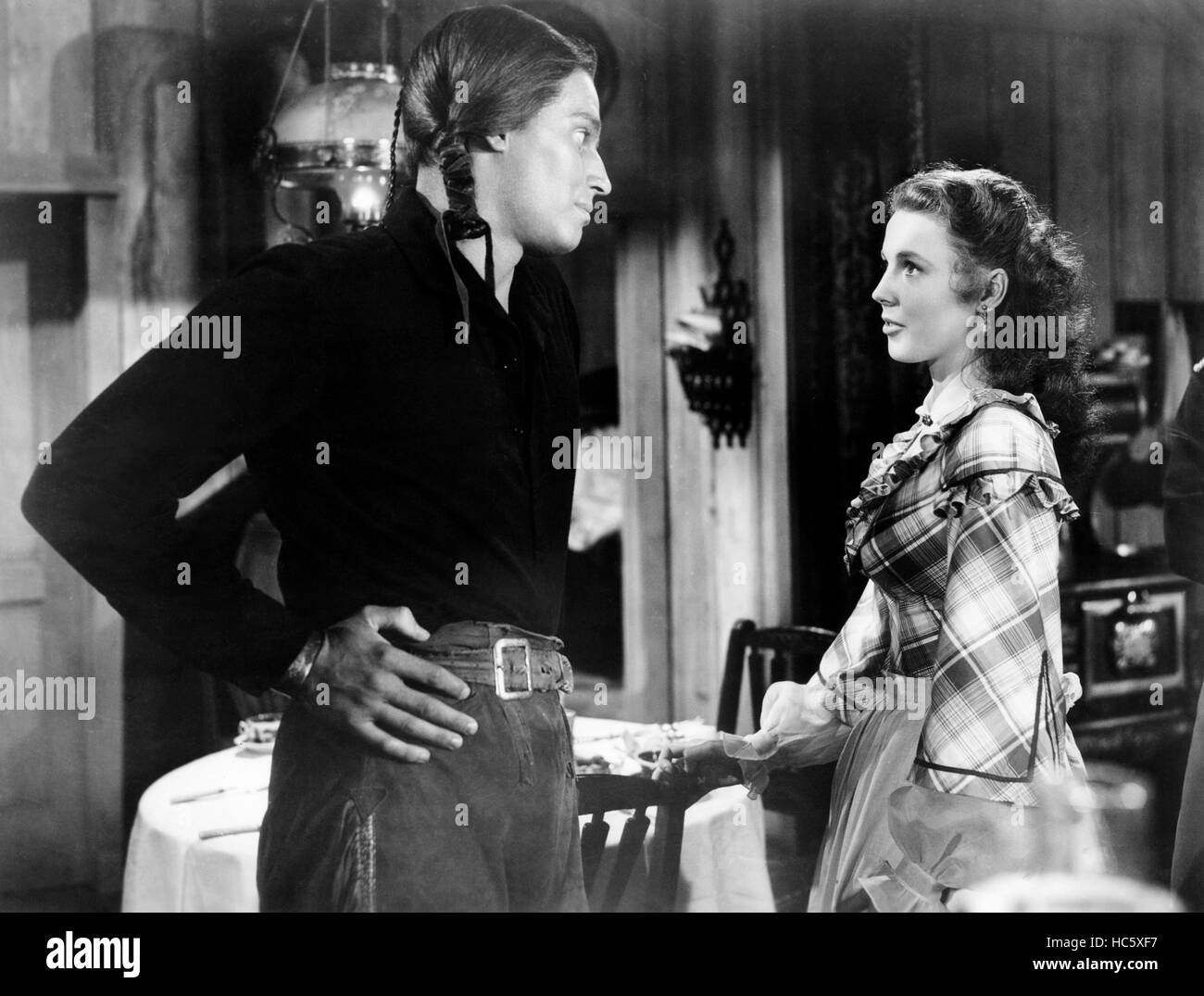 THE SAVAGE, from left, Charlton Heston, Susan Morrow, 1952 Stock Photo ...