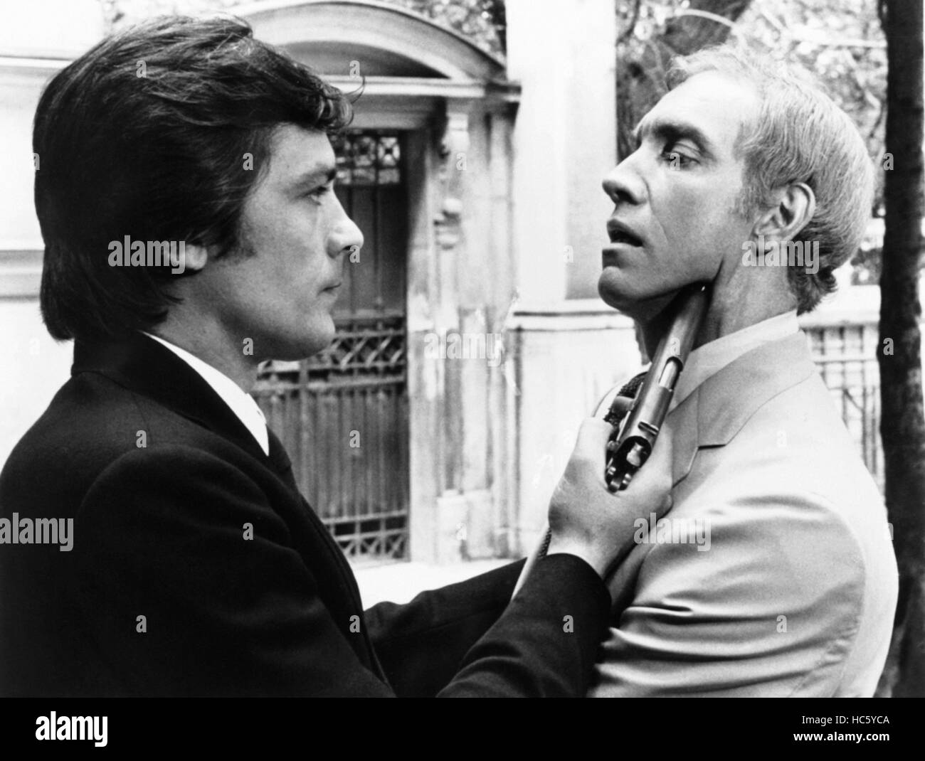 SCORPIO, from left, Alain Delon, William Smithers, 1973 Stock Photo - Alamy